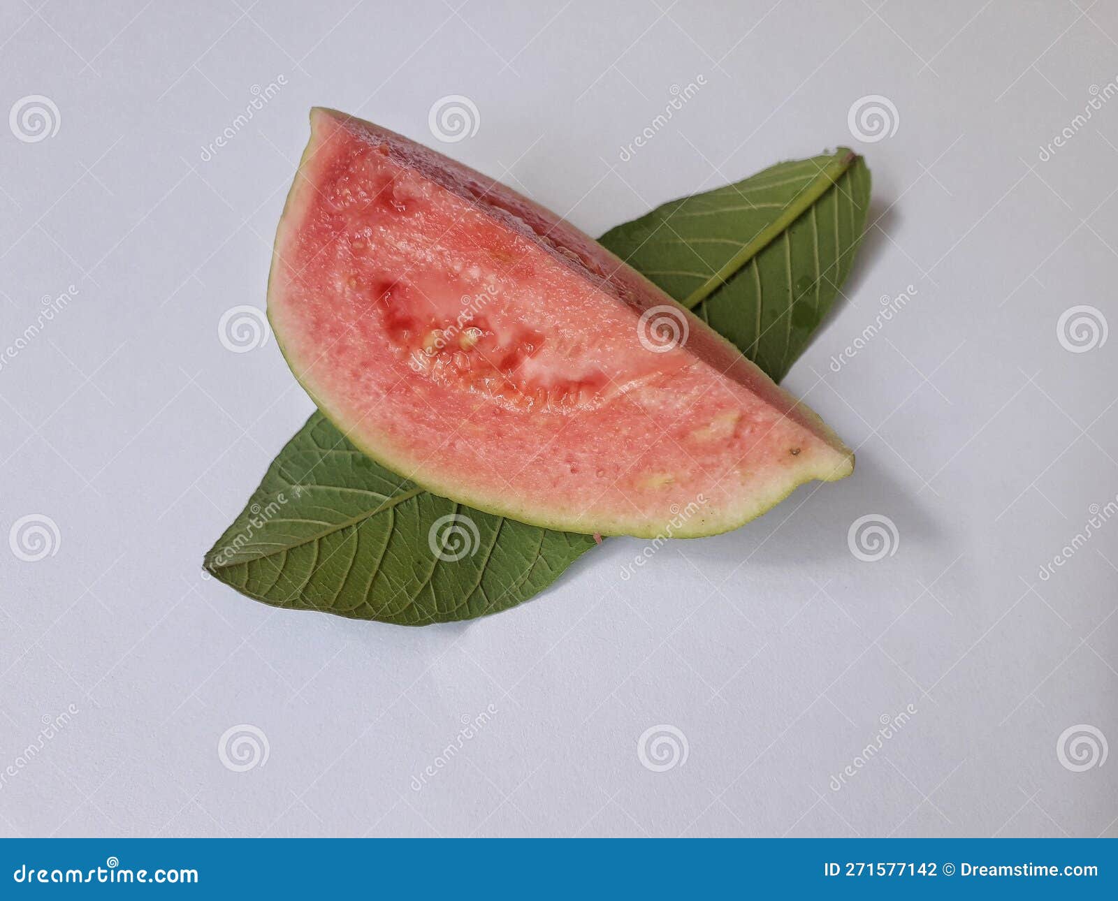 Pieces of Guava Fruit on the Leaves with a White Background Stock Photo ...