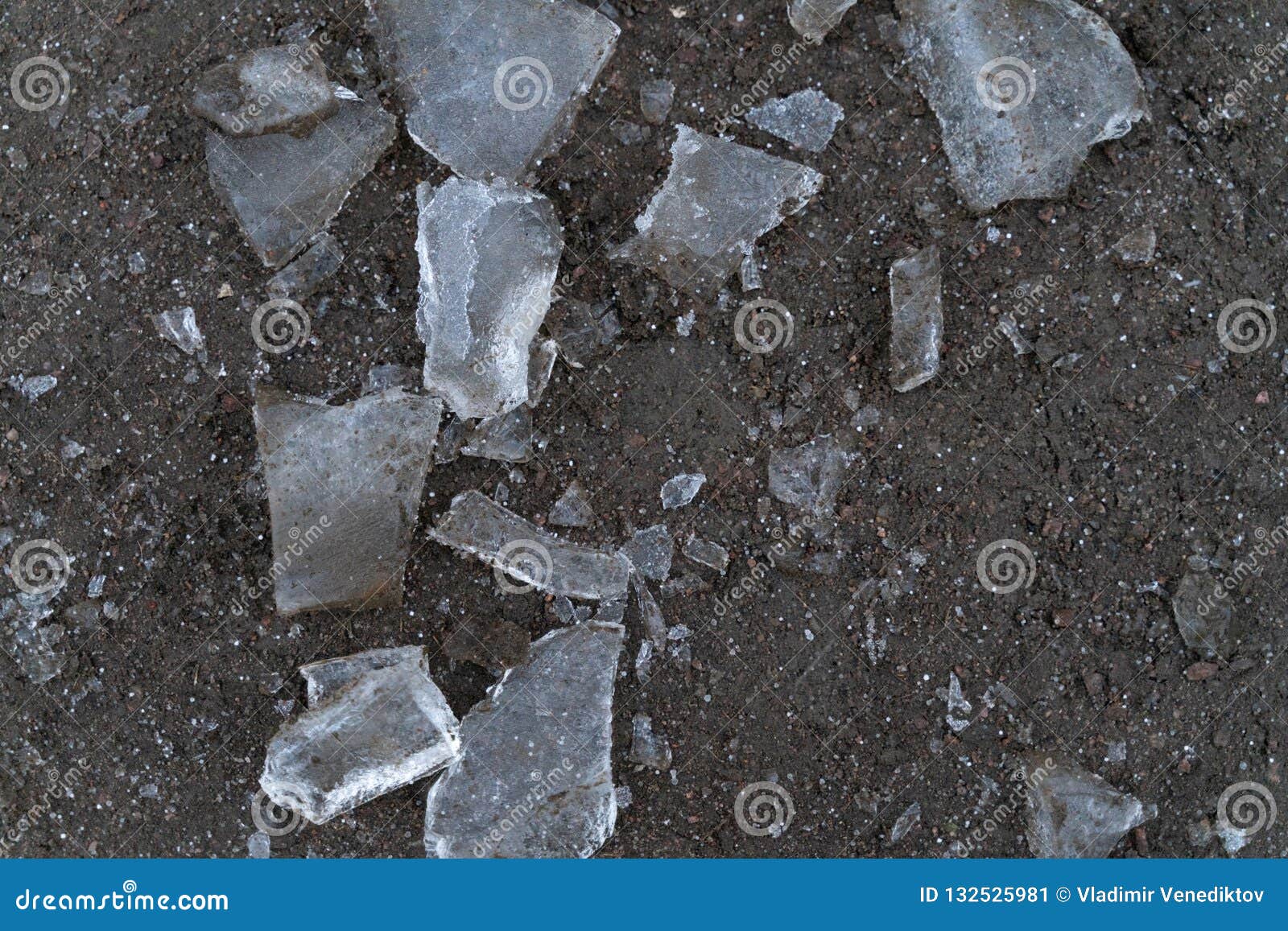 Pieces of Ice on the Grey Ground As a Background Stock Image - Image of ...