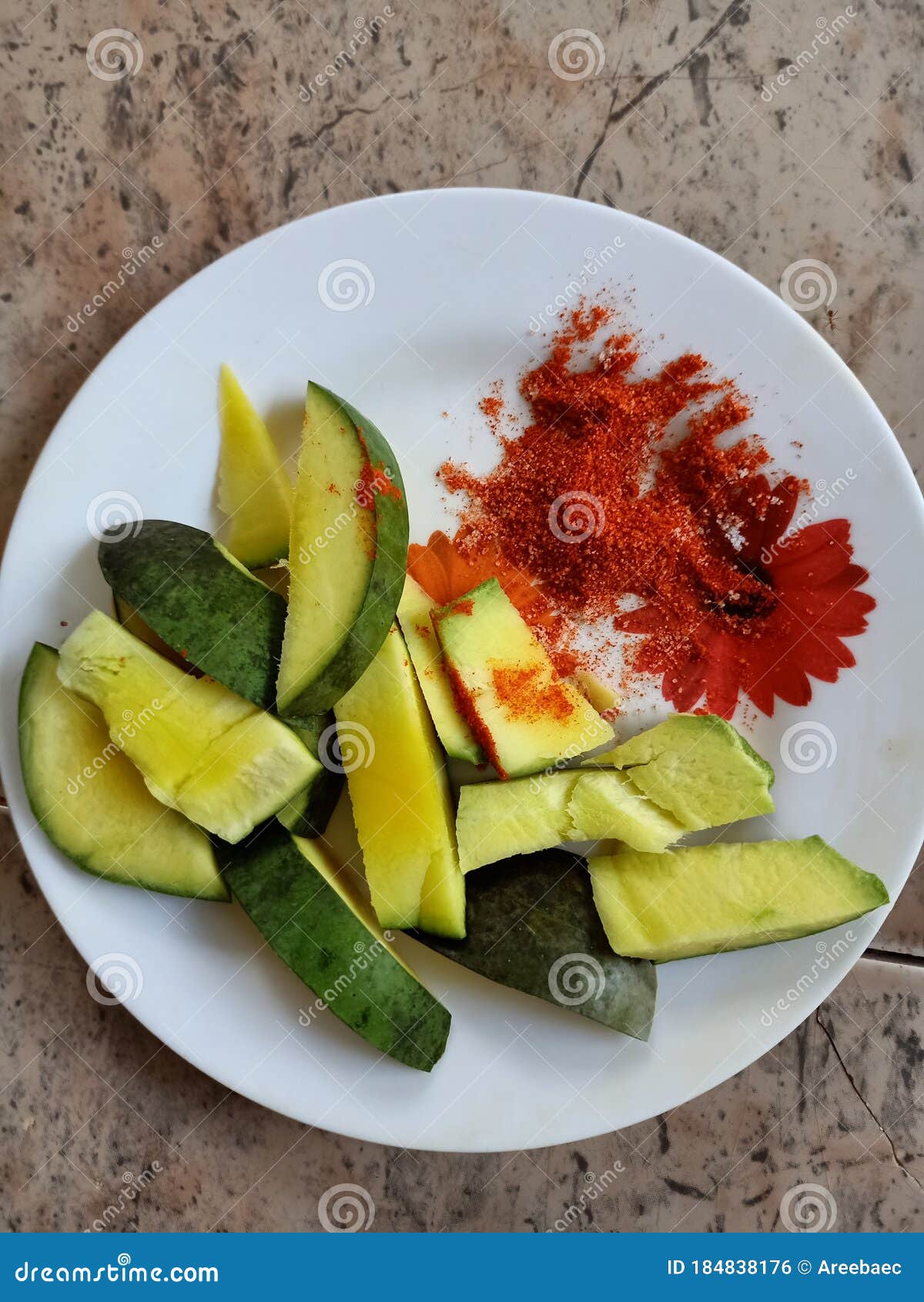 Pieces of Mango with Red Chilli Powder and Salt Stock Photo - Image of ...