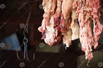 Pieces of meat hanging stock photo. Image of culture - 12321368