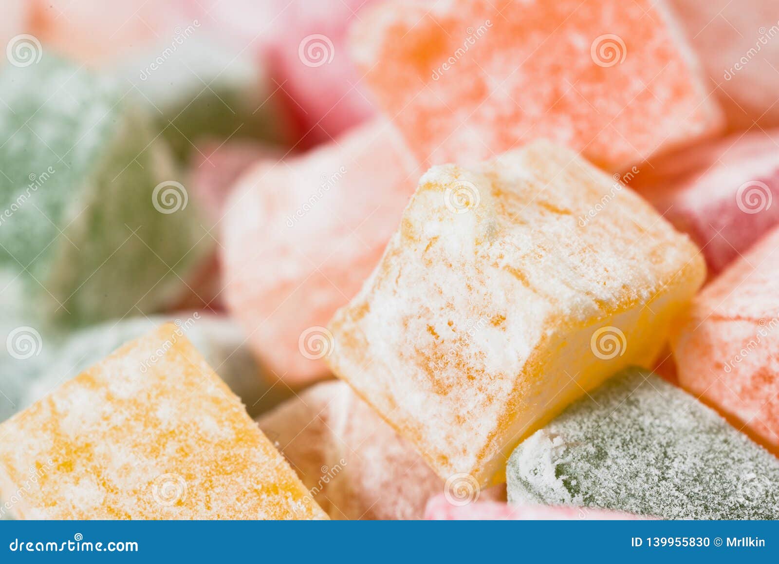 Pieces of Multicolored Turkish Delight in Powdered Sugar. Stock Photo ...