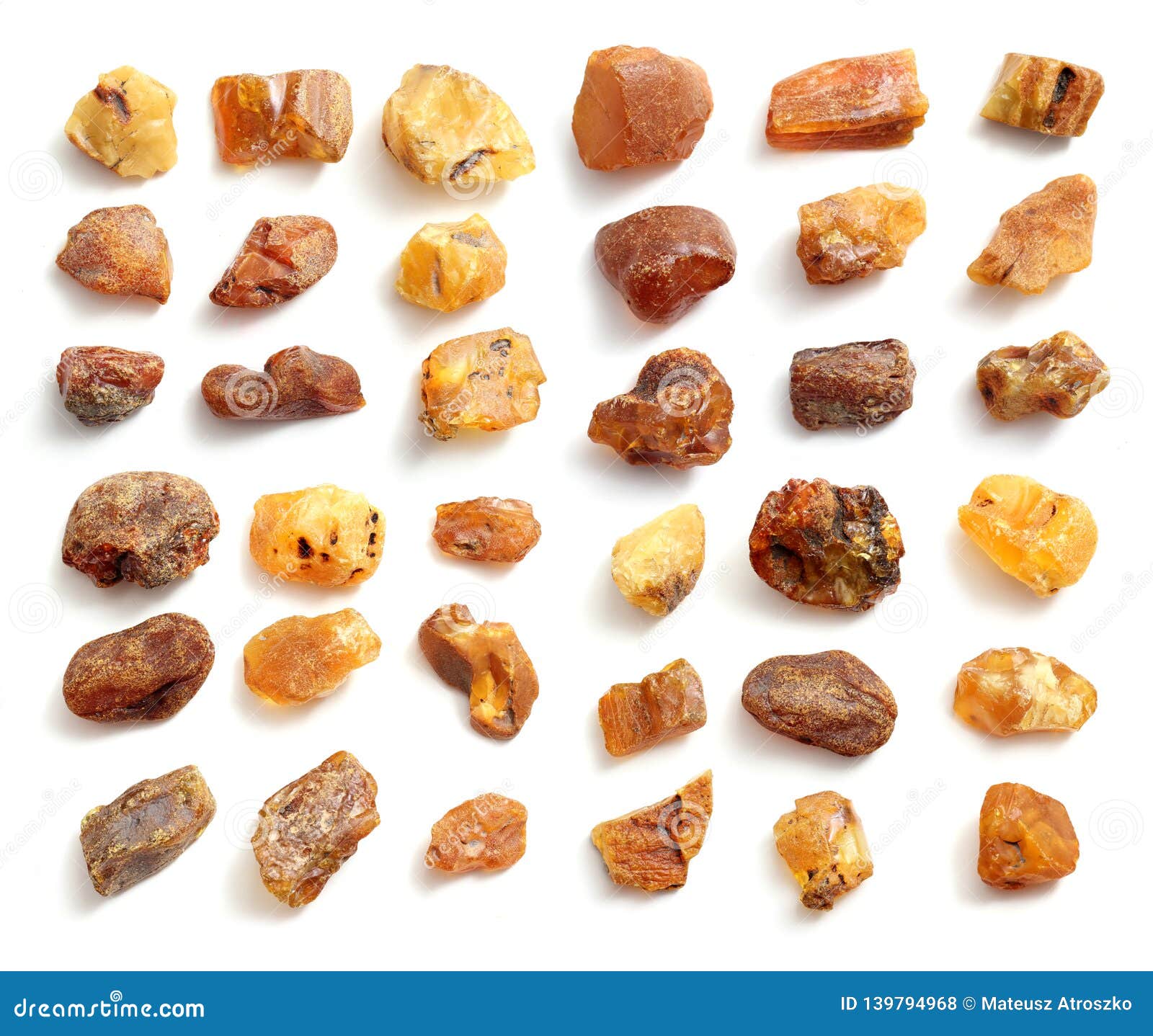 Natural Raw Amber Stone Isolated on White Background. Multiple Amber ... Natural Raw Amber Stone Isolated on White Background. Multiple Amber ...
