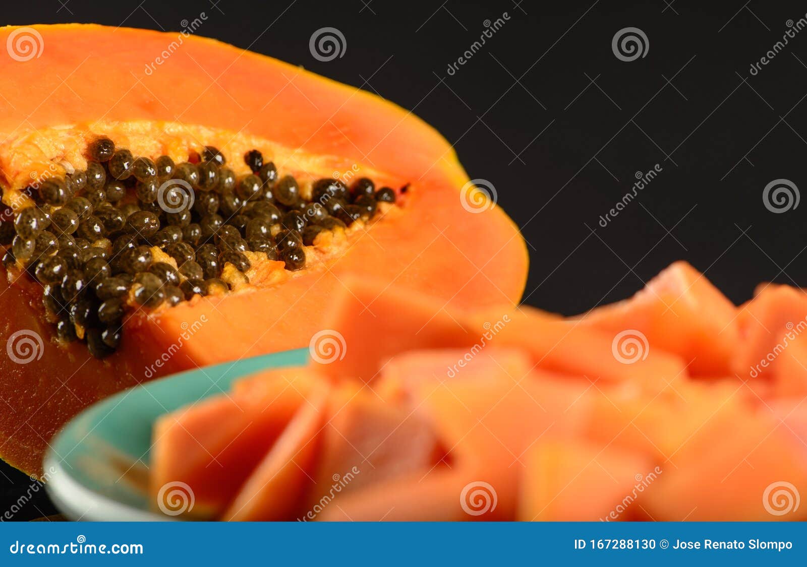 Pieces of papaya in dish stock photo. Image of fresh - 167288130