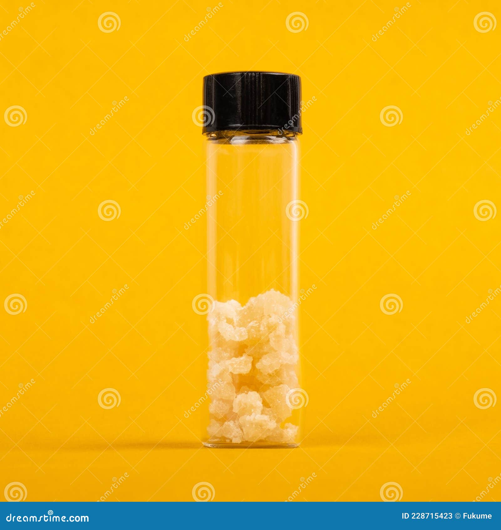 A Pieces of Pure Hash Dab Crystal Cannabis on Yellow Background Stock ...