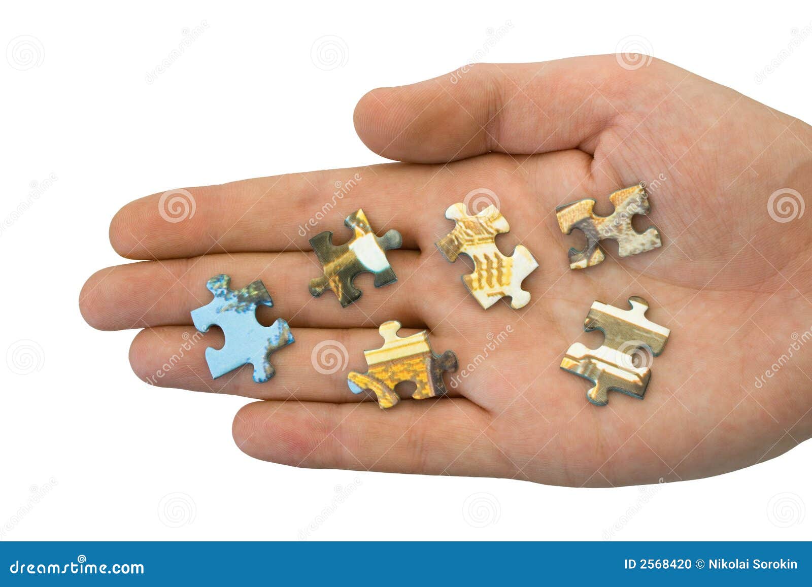 Pieces of puzzle on hand stock photo. Image of hobbies - 2568420