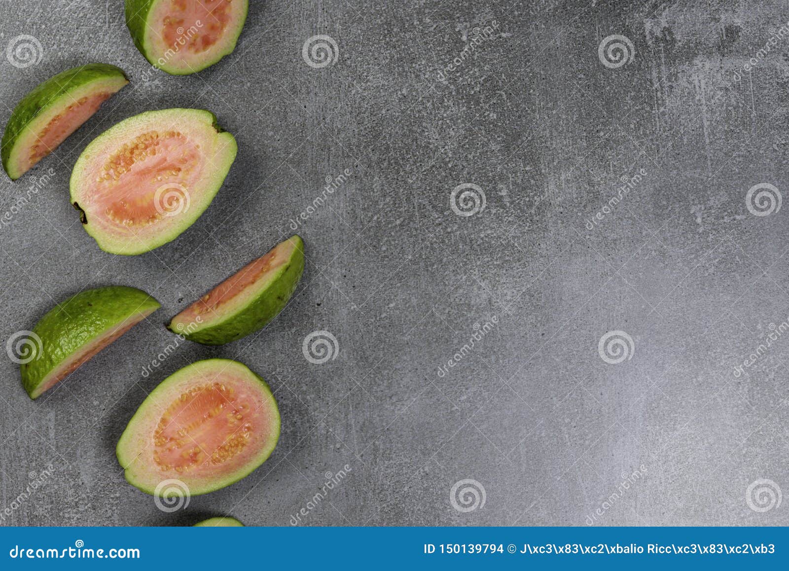 Pieces of Red Guava on Concrete. Concrete Texture Stock Photo - Image ...