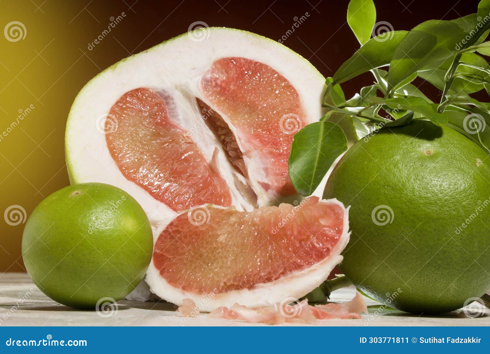 Pieces of Red Pomelo Fruit on an Orange Background, Stock Image - Image ...