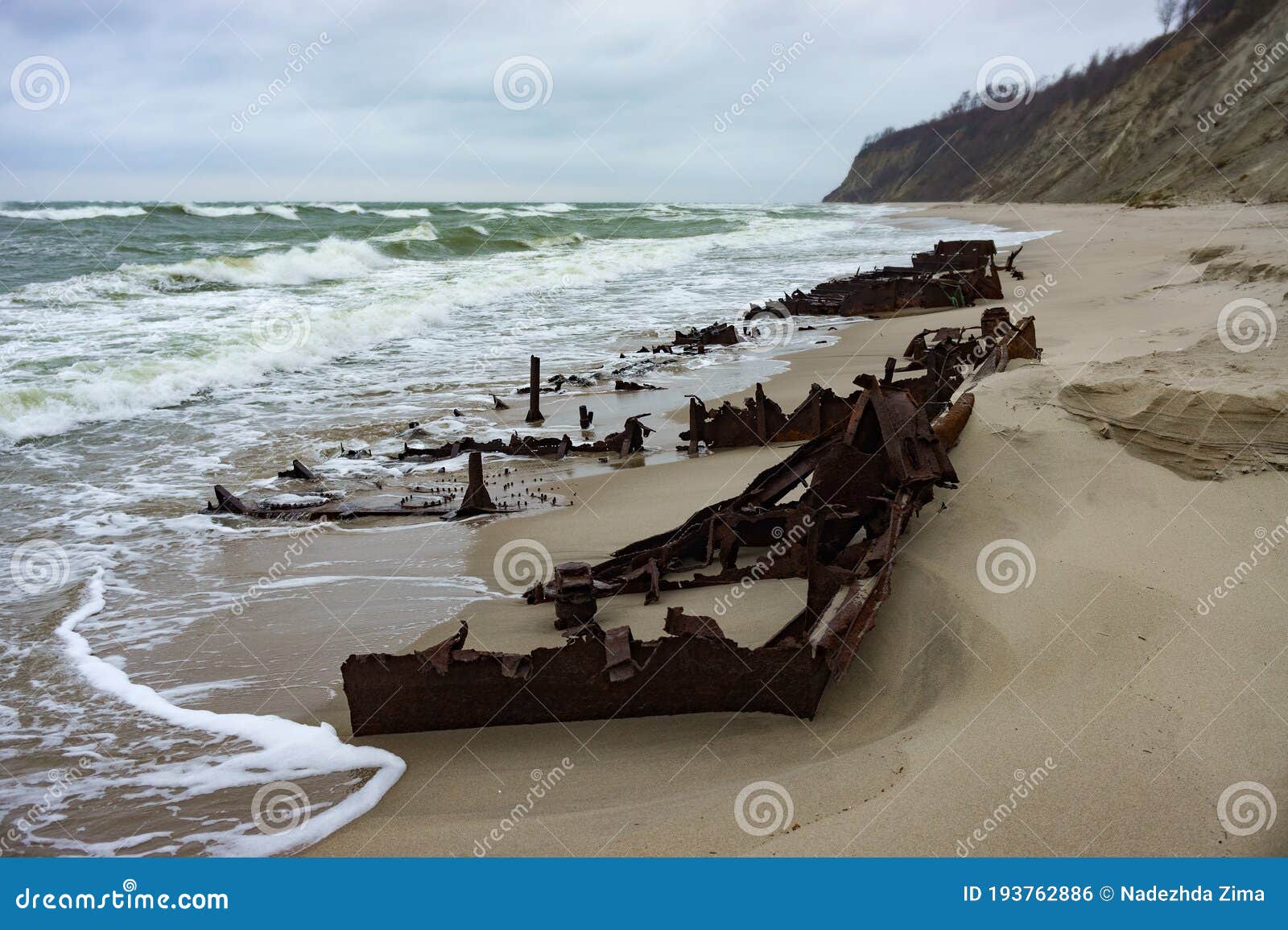 Pieces of Rusty Iron on the Seashore, the Remains of a Ship on the Sand ...