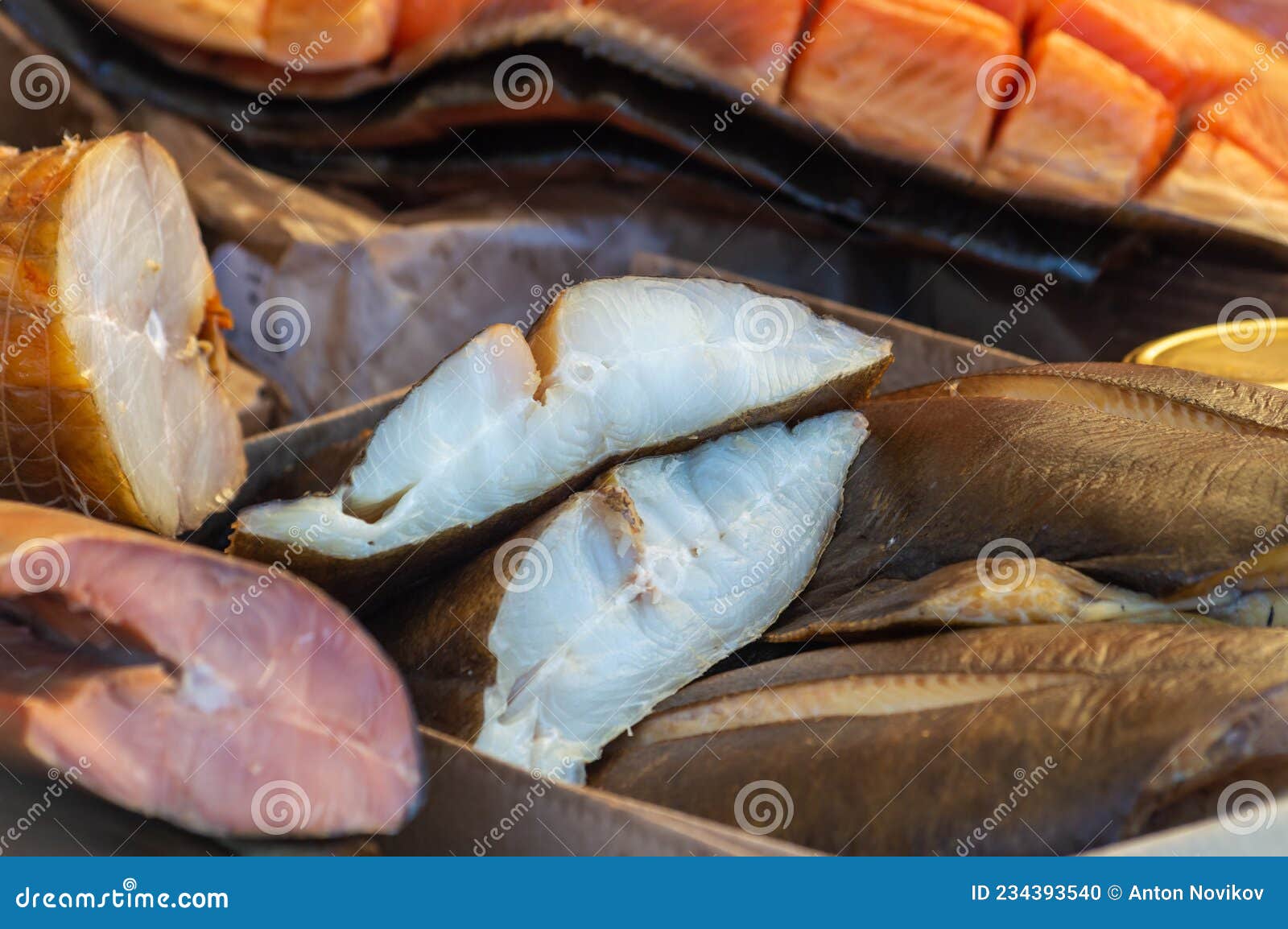 Pieces of Smoked Fish on the Store Counter Stock Photo - Image of ...