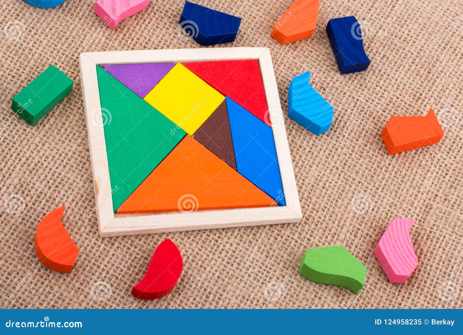 Pieces of a Square Tangram Puzzle Stock Image - Image of wooden ...