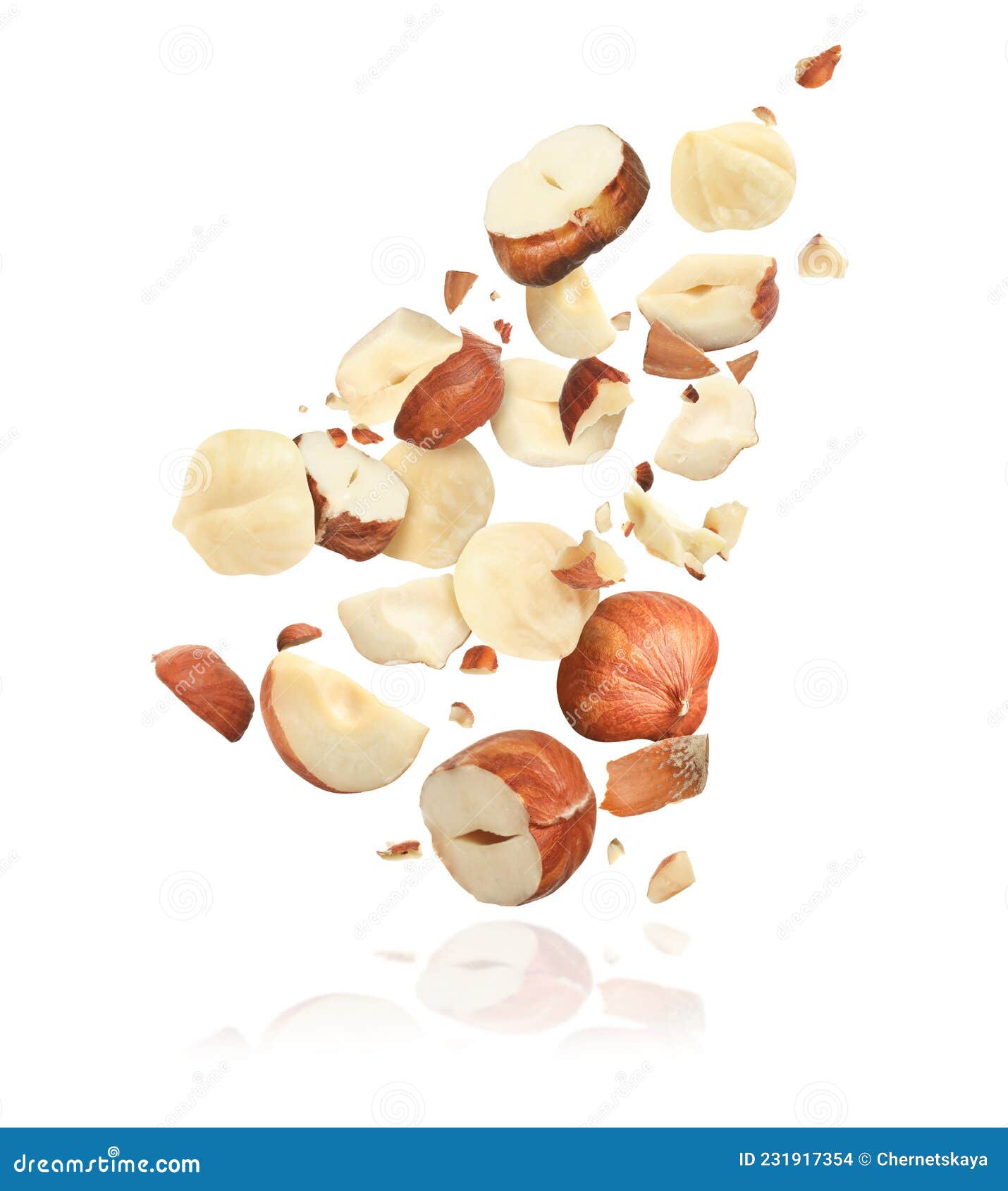 Pieces of Tasty Hazelnuts Falling on White Background Stock Photo ... Pieces of Tasty Hazelnuts Falling on White Background Stock Photo ...