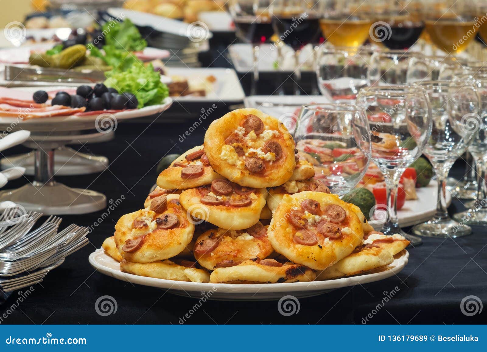 Pieces of tiny pizzas stock image. Image of tiny, table - 136179689