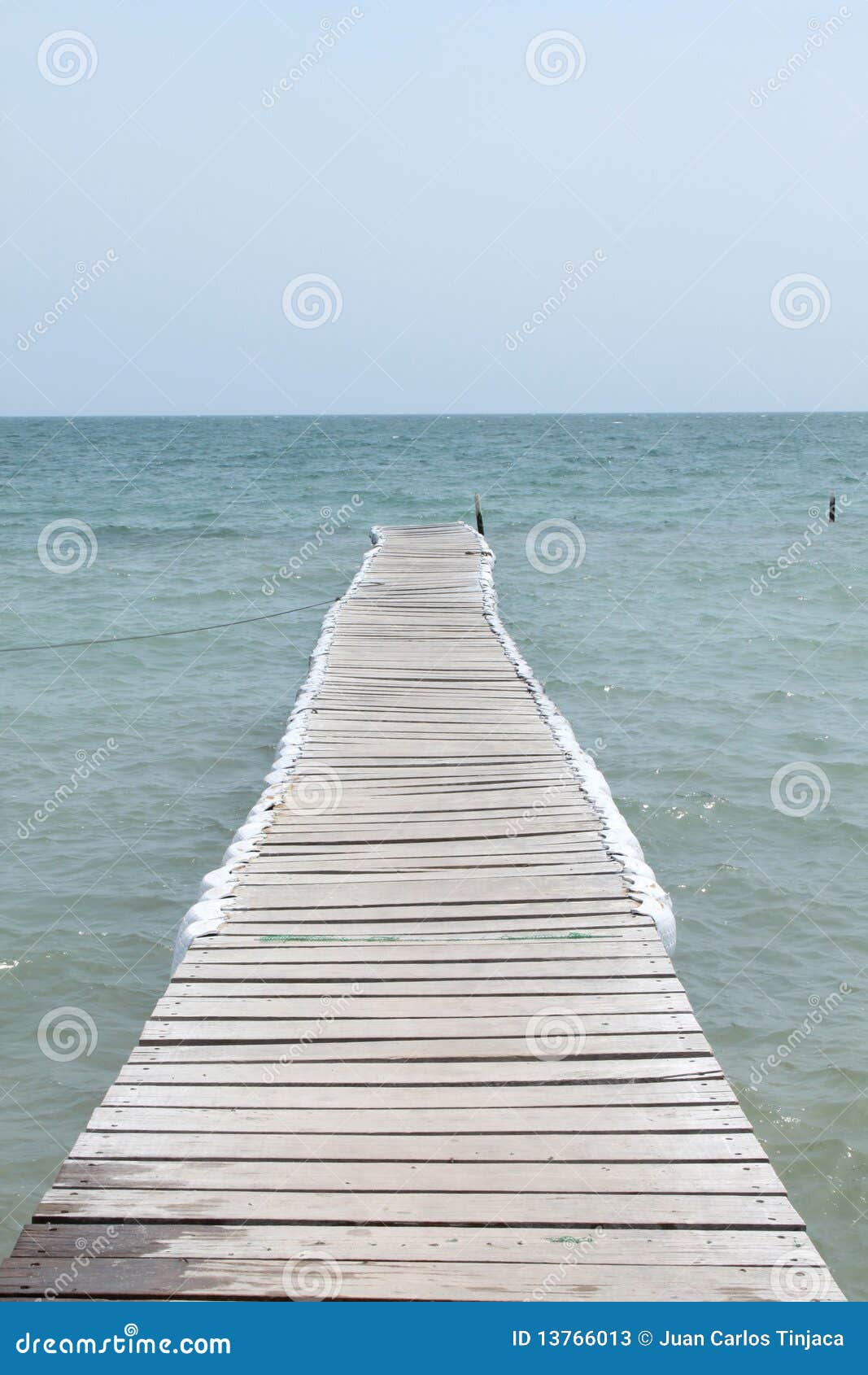 Pier at beach stock image. Image of bench, coast, shore - 13766013