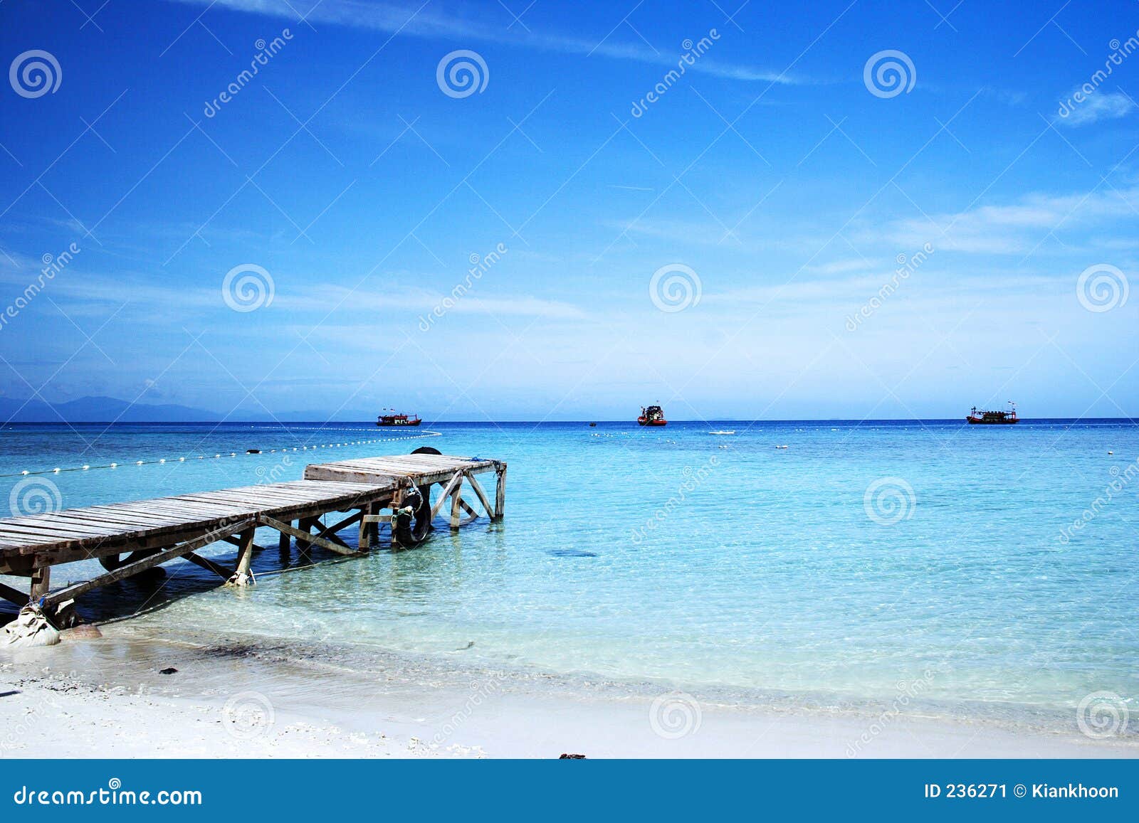 Pier on Beach stock image. Image of peaceful, beach, pillar - 236271