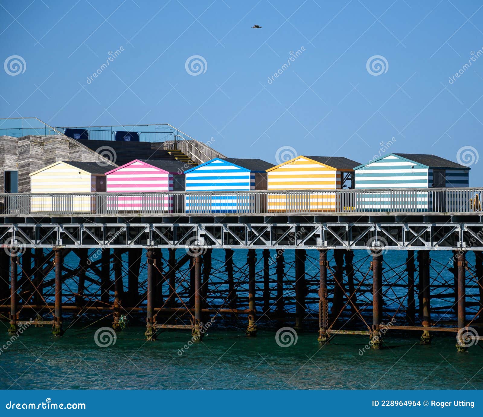 Pier beach huts stock photo. Image of hastings, sussex - 228964964
