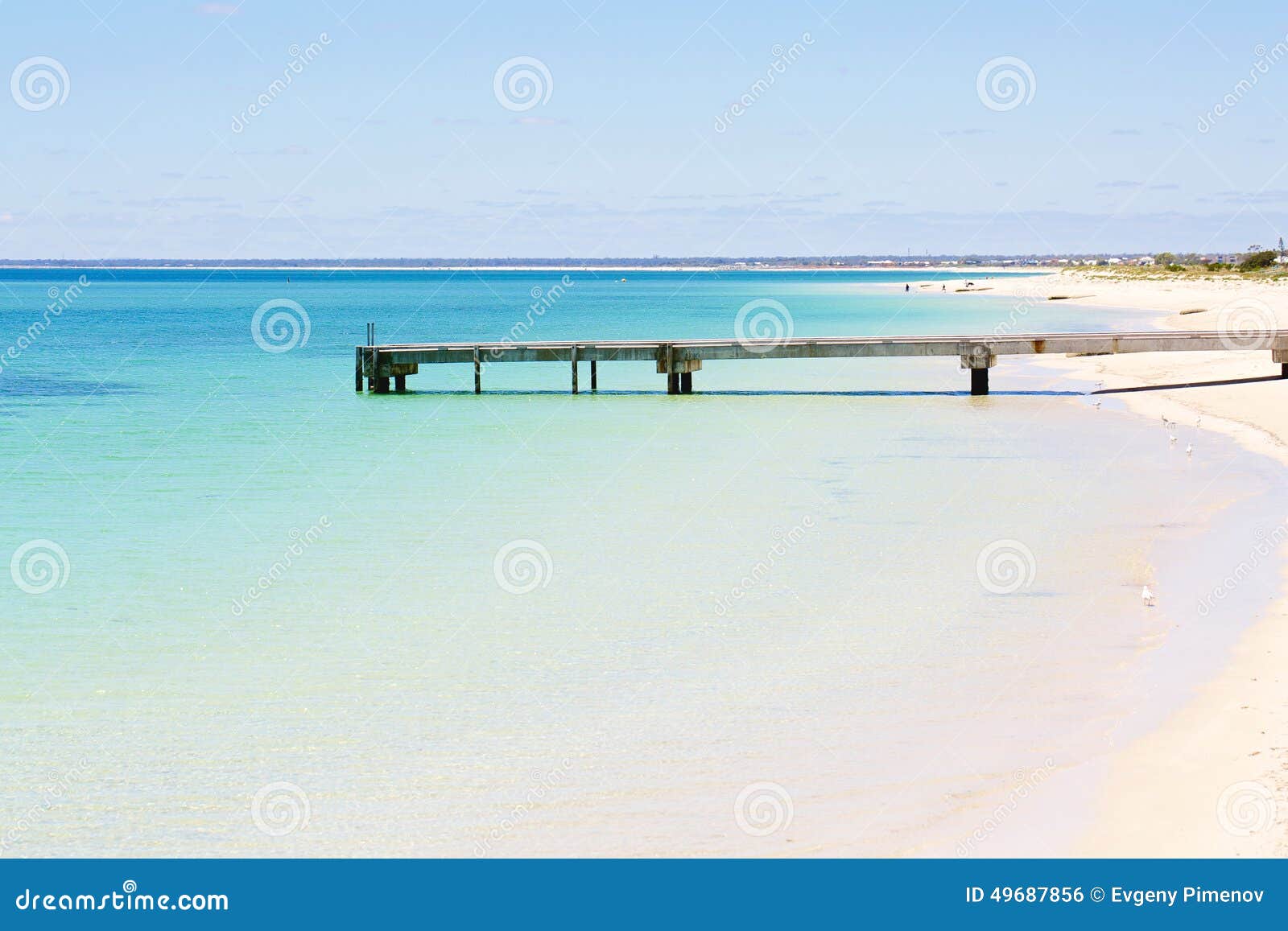 Pier in Blue Water of the Ocean Shore Stock Photo - Image of nature ...