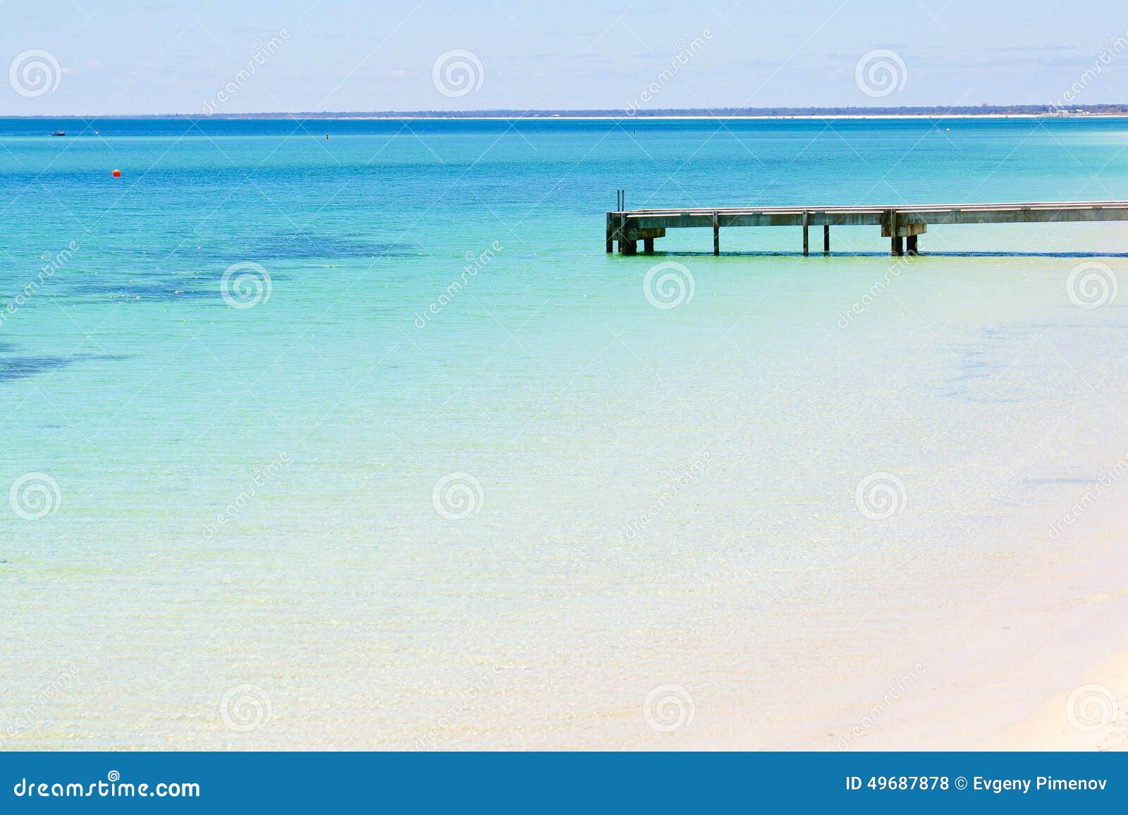 Pier in Blue Water of the Ocean Shore Stock Photo - Image of ocean ...