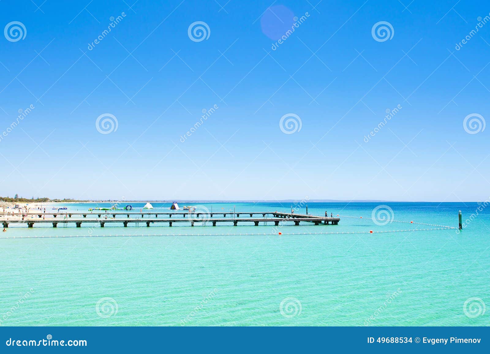 Pier in Blue Water of the Ocean Shore Stock Photo - Image of outdoor ...