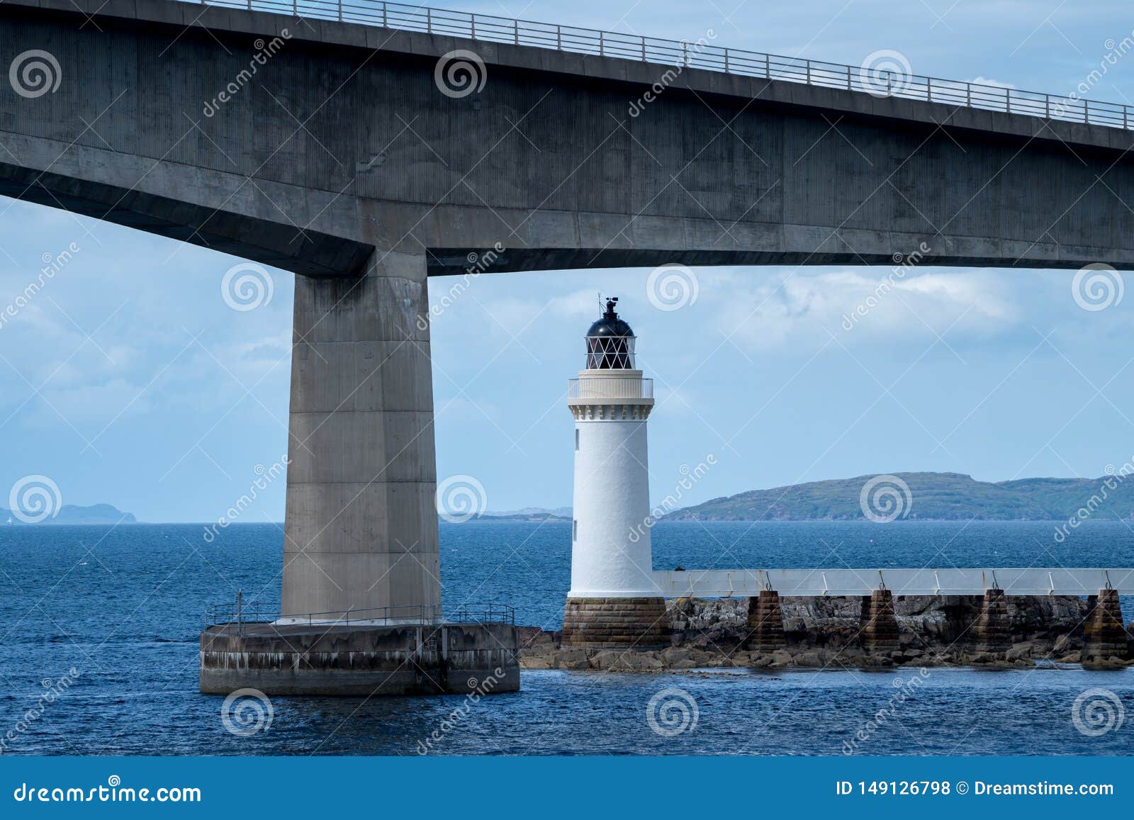 A bridge and a lighthouse stock photo. Image of lighthouse - 149126798