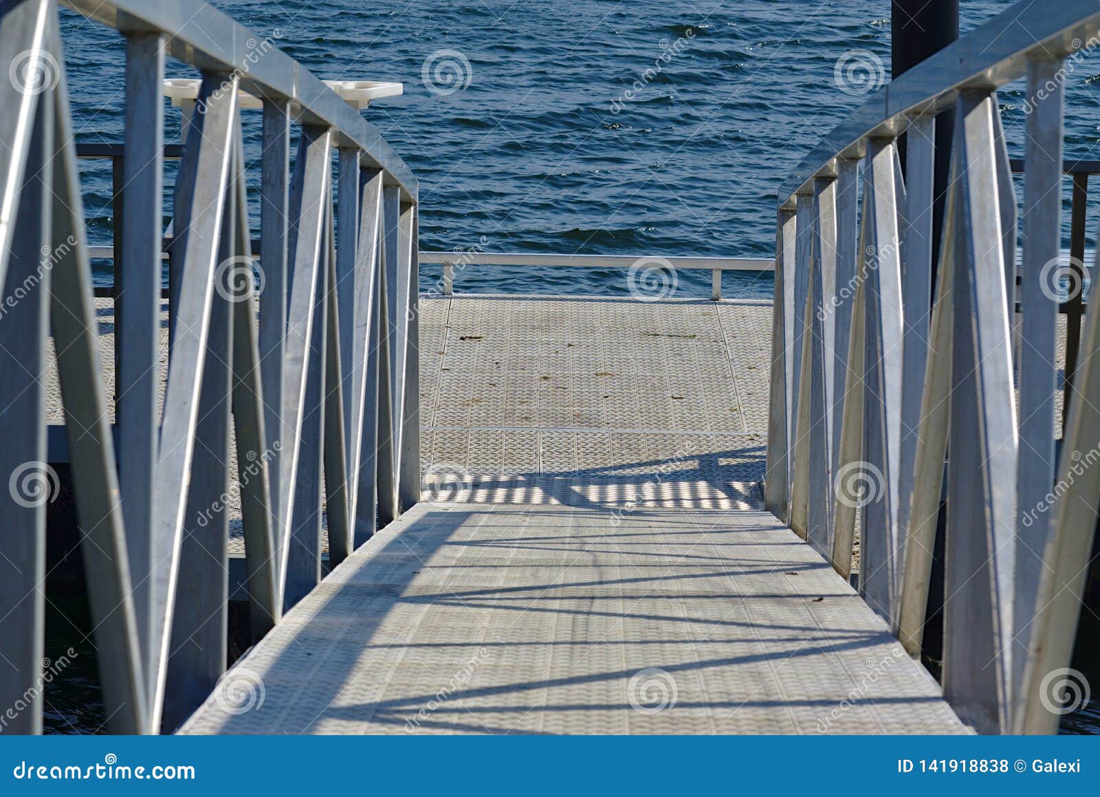 Pier Bridge with Silver Gate Going Down Direction Stock Photo - Image ...