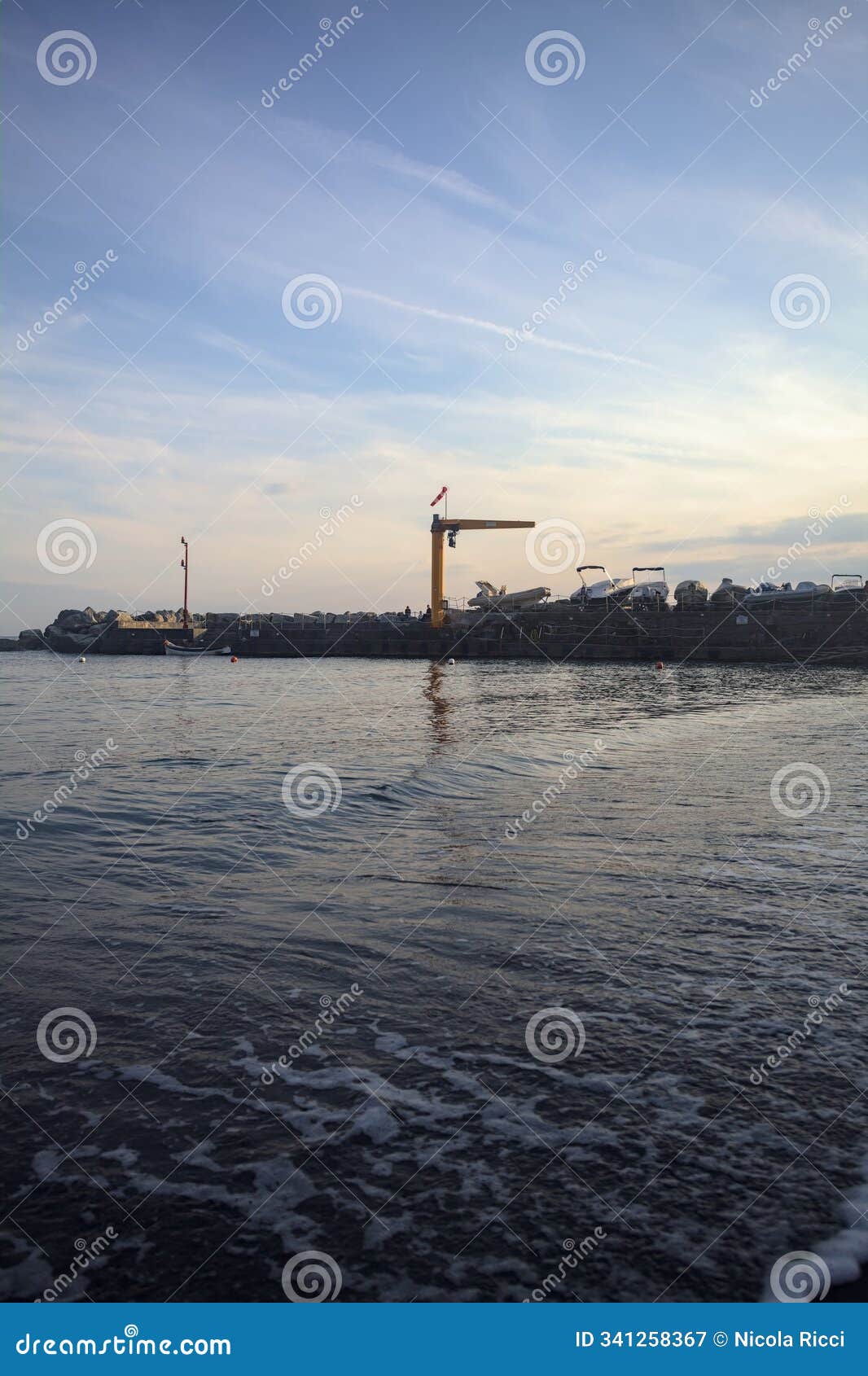 Pier counter lit at sunset stock image. Image of resort - 341258367