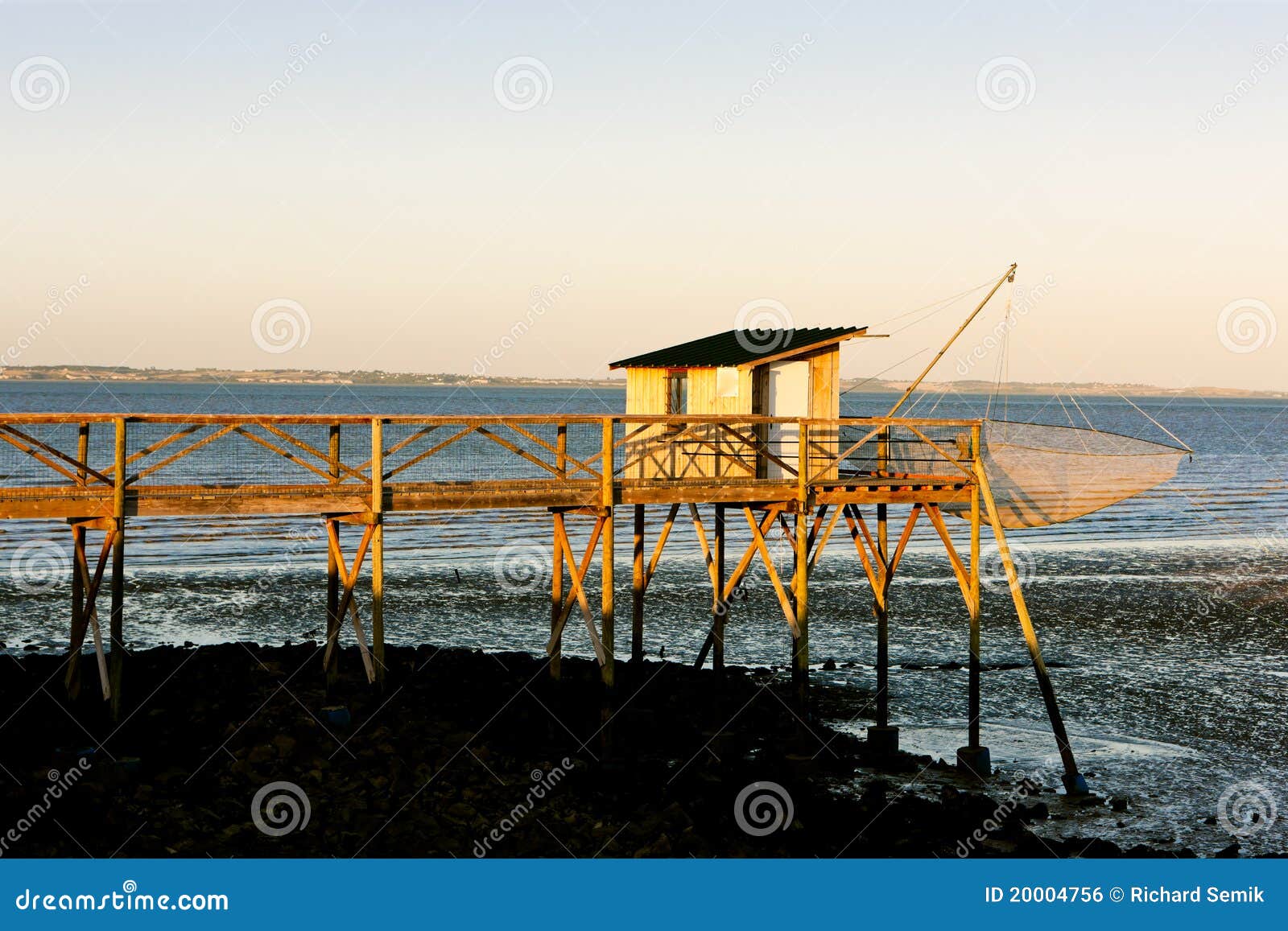 Pier with fishing net stock photo. Image of shore, pier - 20004756