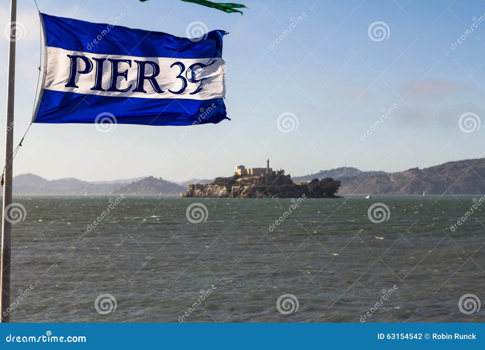 Pier 39 Flag with View on Alcatraz Island, San Francisco Stock Photo ...