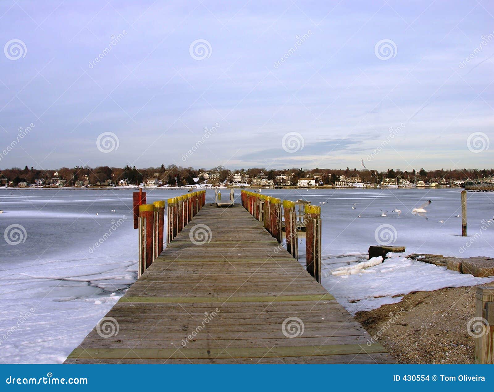 Pier and a frozen harbor. stock photo. Image of england - 430554
