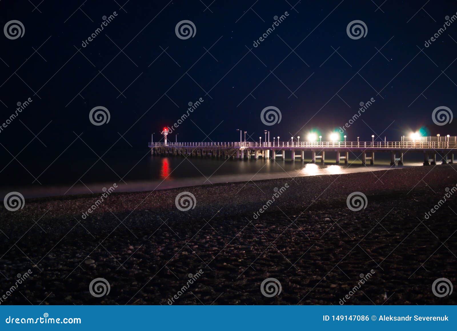 The Pier is Illuminated by Night Lights. Stock Photo - Image of city ...