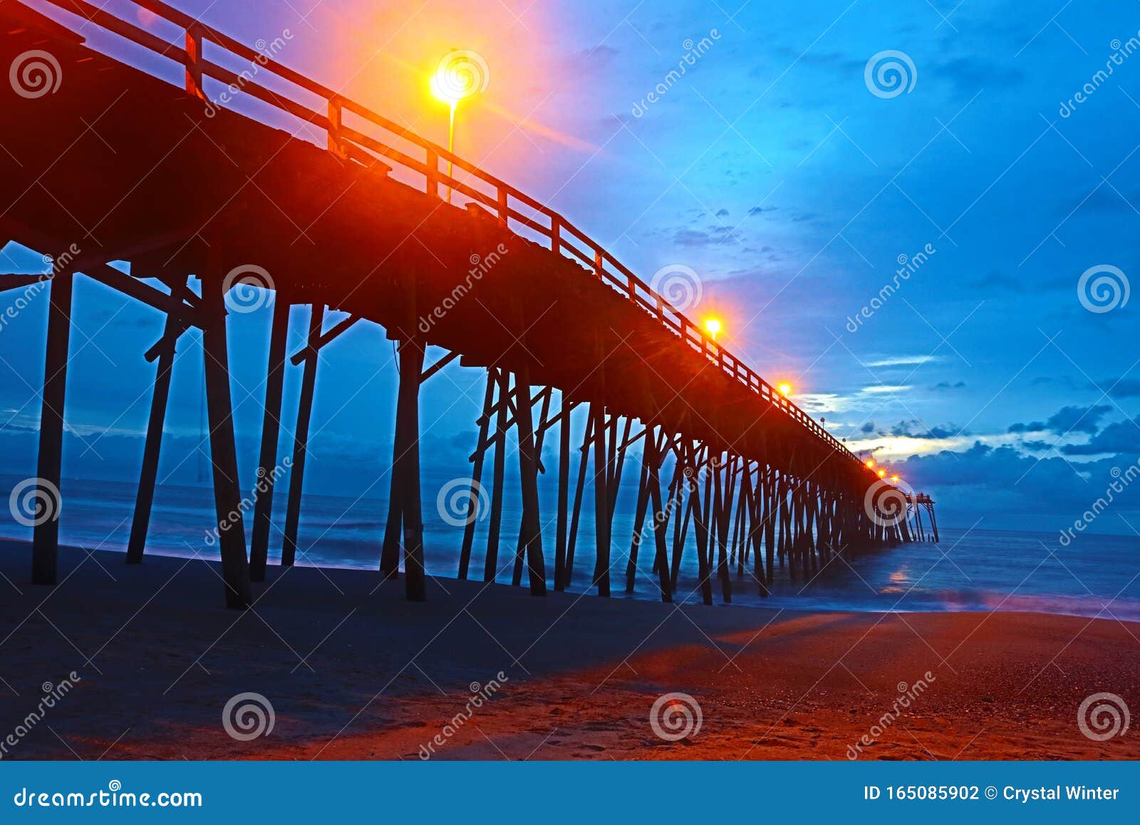 Pier at night time stock photo. Image of time, night - 165085902