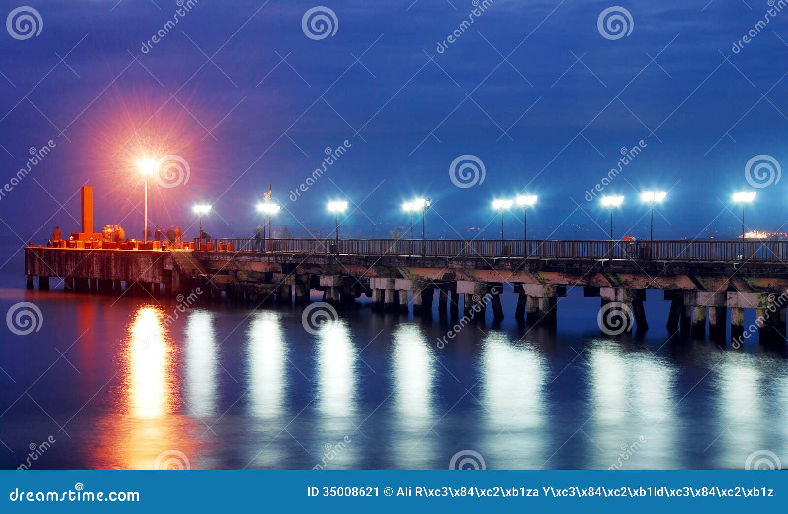Pier at nights stock image. Image of holiday, beach, long - 35008621