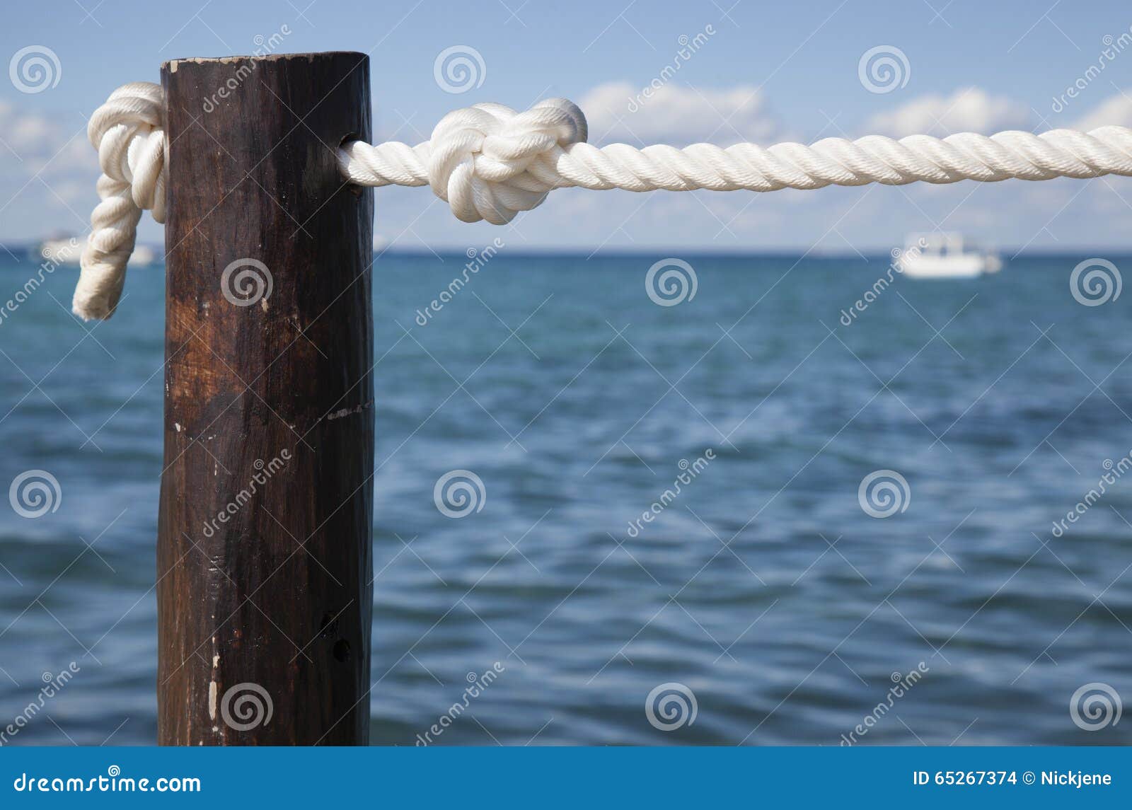 Pier Pile and Rope Overlooking Ocean Stock Photo - Image of boat, water ...