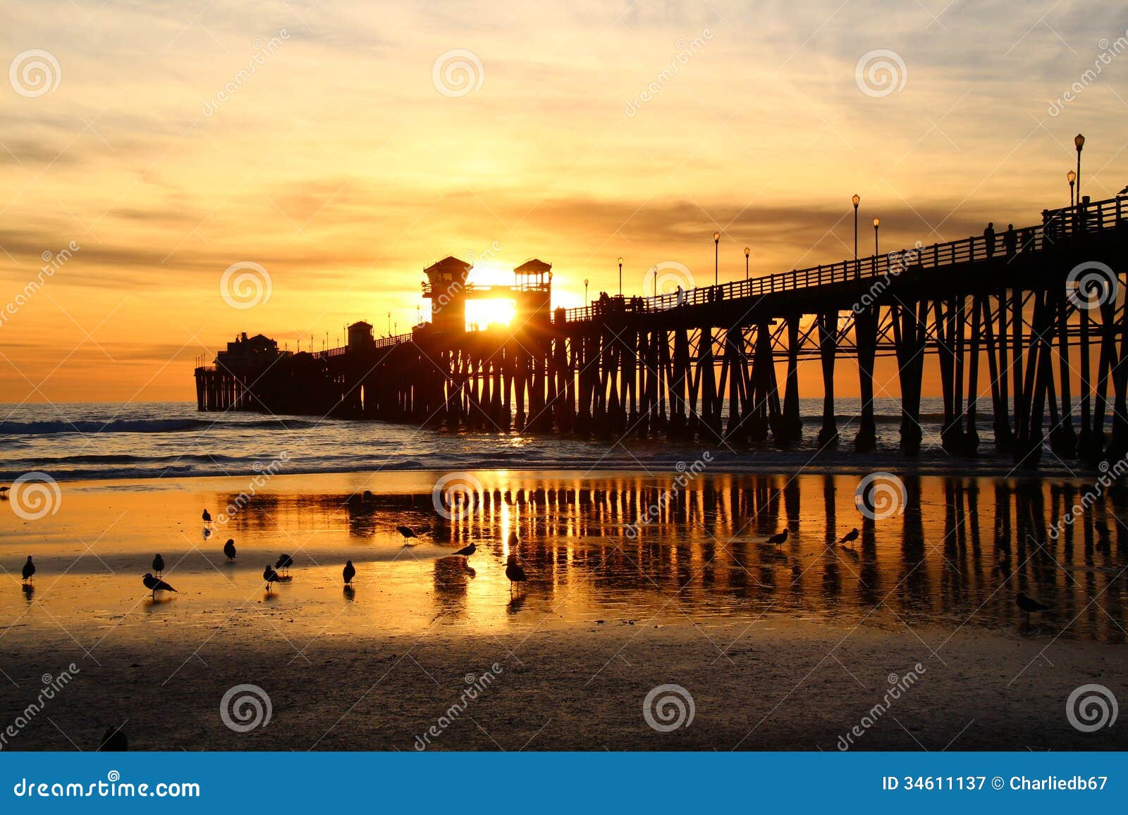 Pier reflections at sunset stock image. Image of black - 34611137
