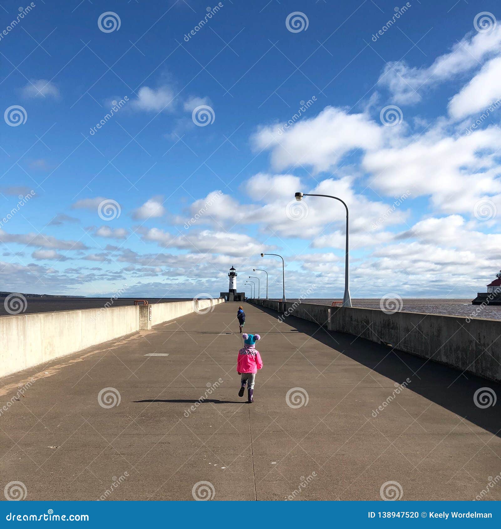 Pier Run stock photo. Image of canal, running, kids - 138947520