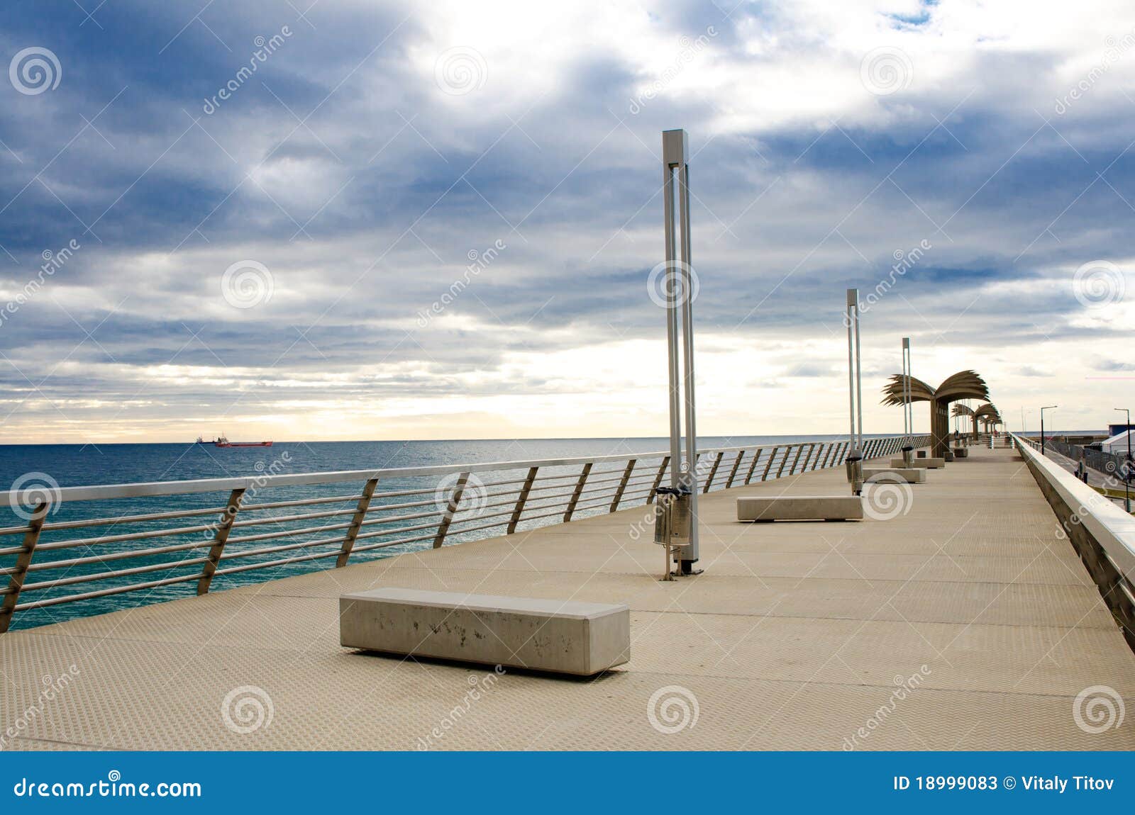 Pier, sea and dramatic sky stock image. Image of ocean - 18999083