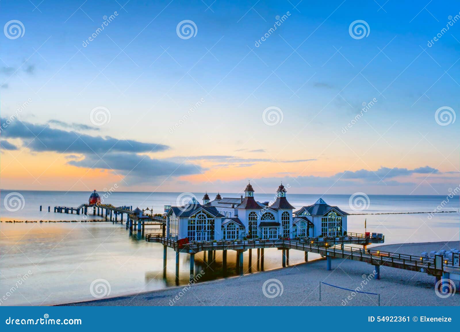 The pier of Sellin at dusk stock image. Image of sellin - 54922361