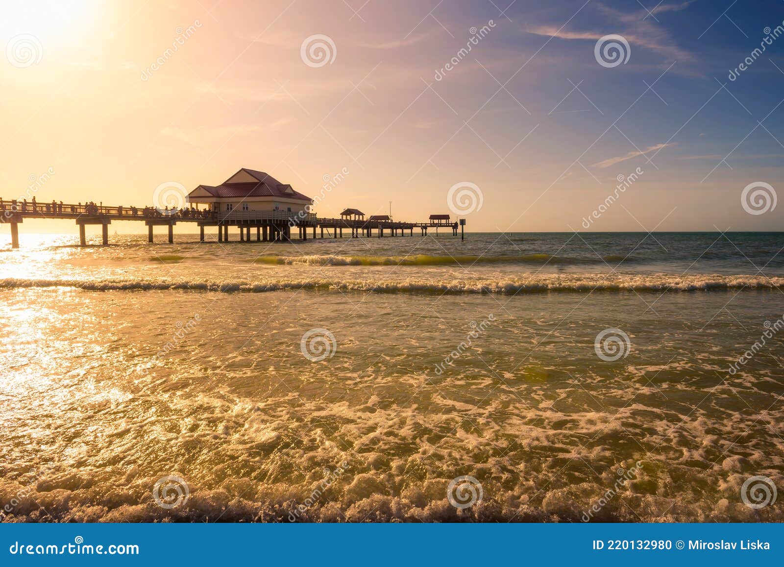 Pier 60 at Sunset on a Clearwater Beach in Florida Stock Photo - Image ...