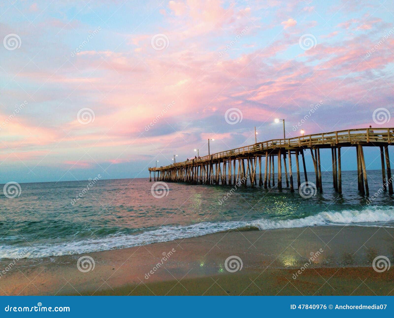 Pier at sunset stock photo. Image of waves, beautiful - 47840976