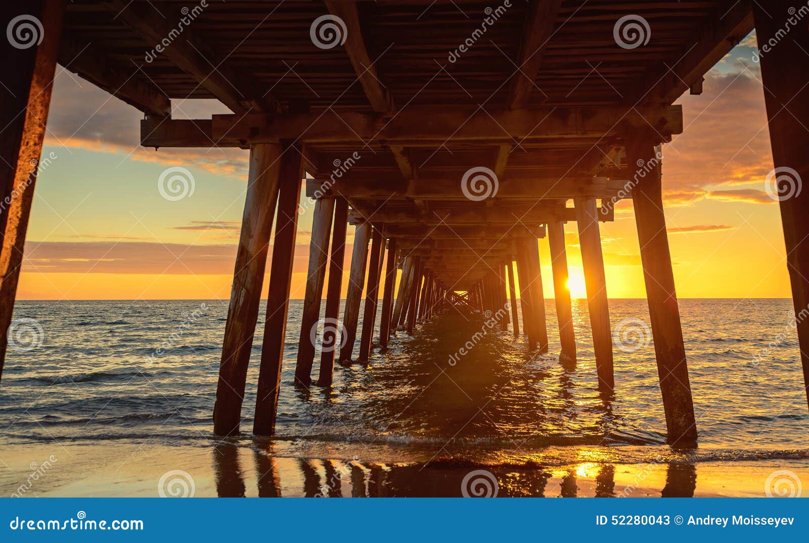 Pier at sunset stock image. Image of beach, beautiful - 52280043