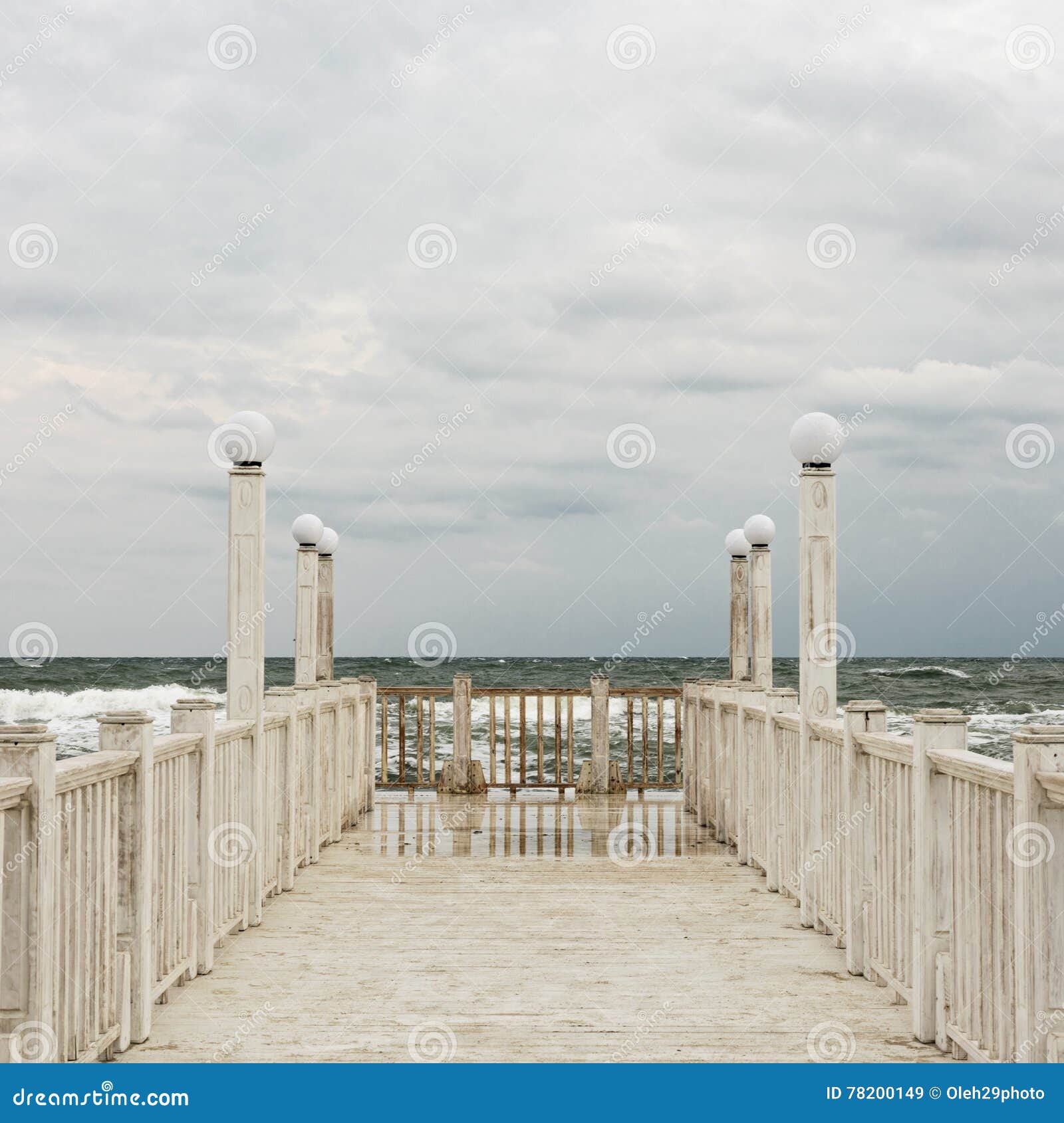 Pier with White Wooden Handrails at Sea during a Storm. Stock Image ...