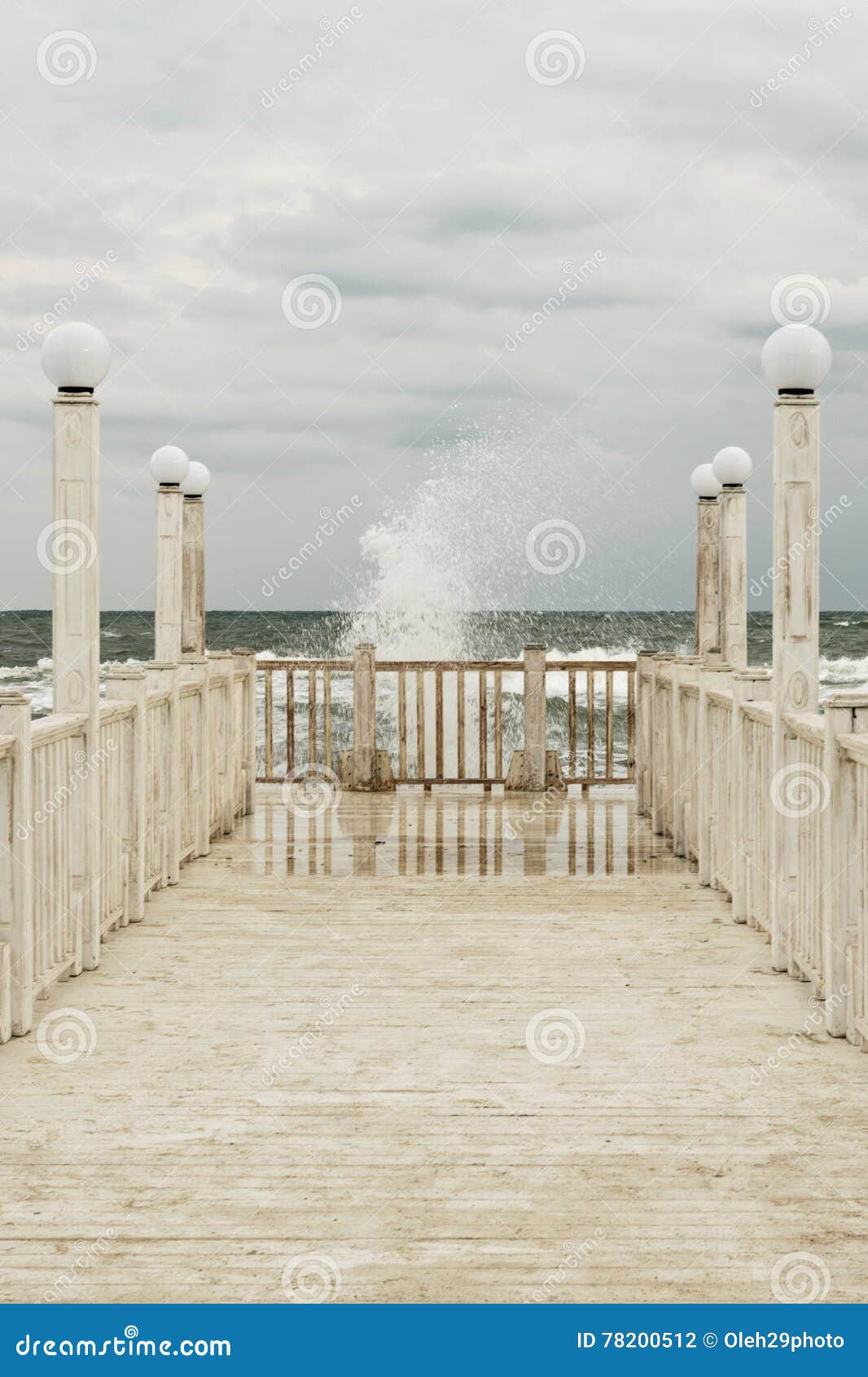 Pier with White Wooden Handrails at Sea during a Storm. Stock Photo ...