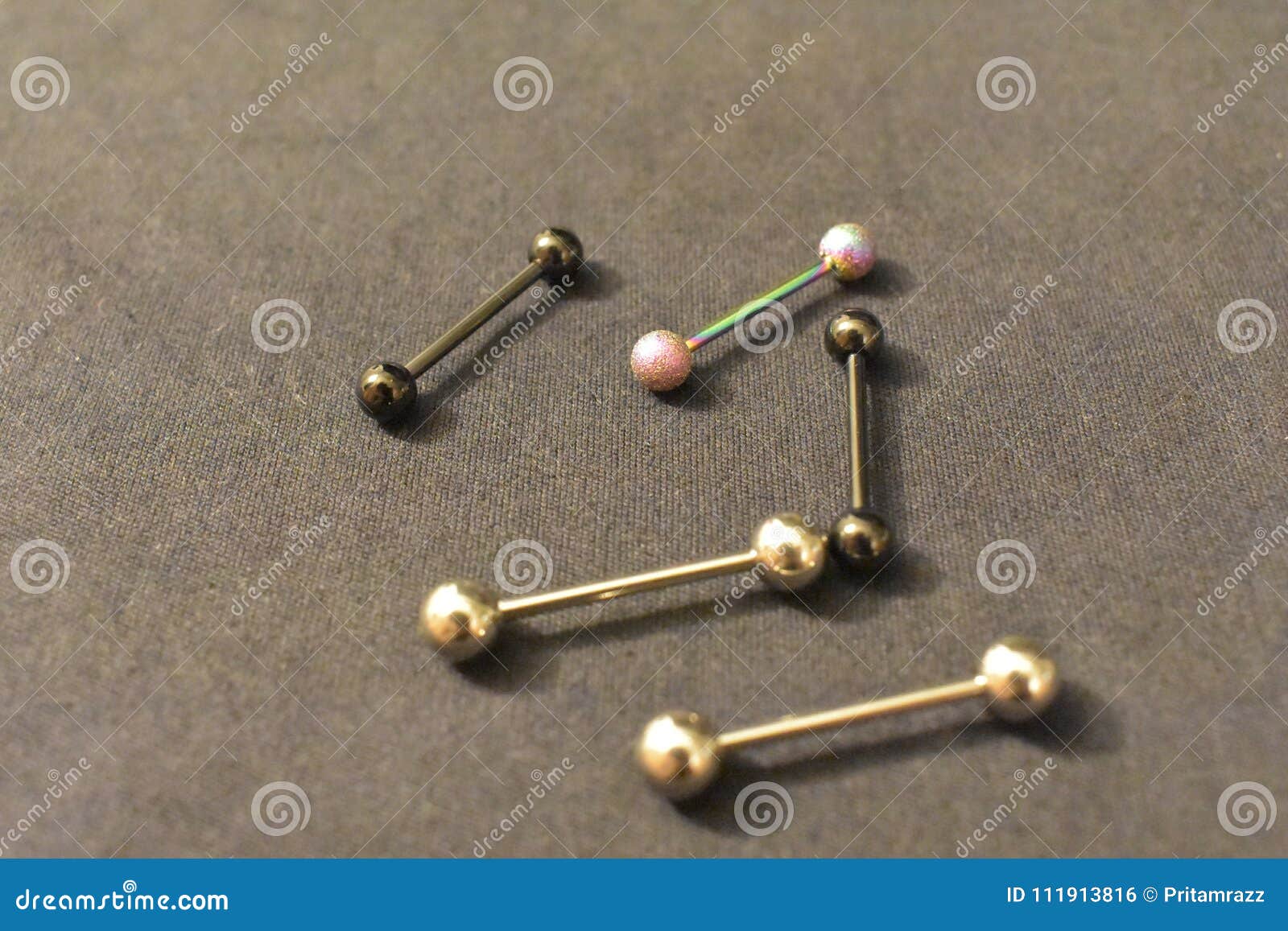 Different Color Toung Piercing Bars Stock Photos - Free & Royalty-Free ...