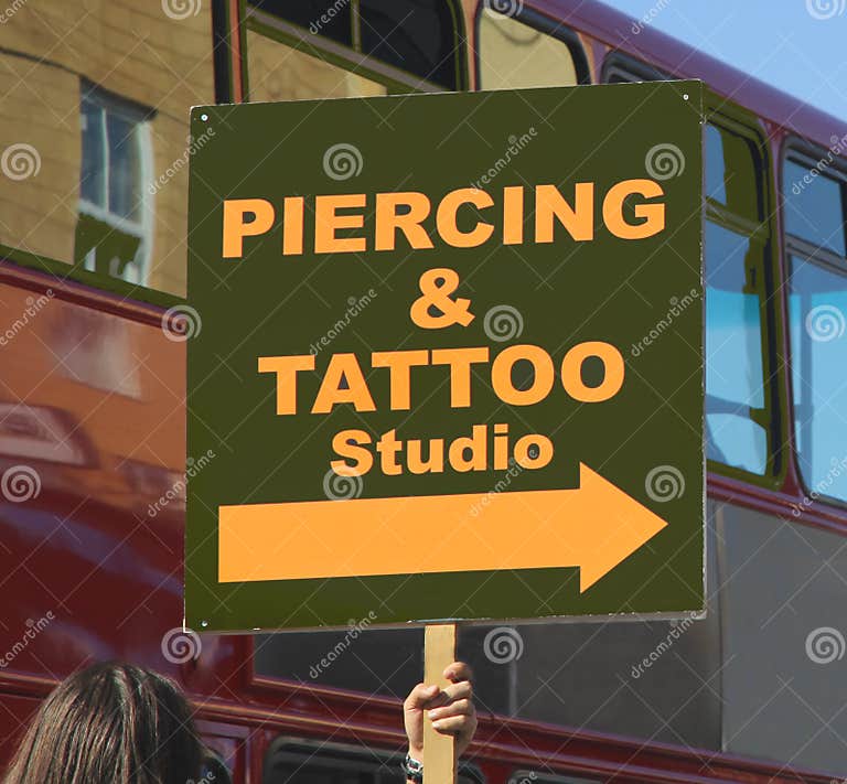 Piercing and Tattoo sign stock photo. Image of promoting - 21426508