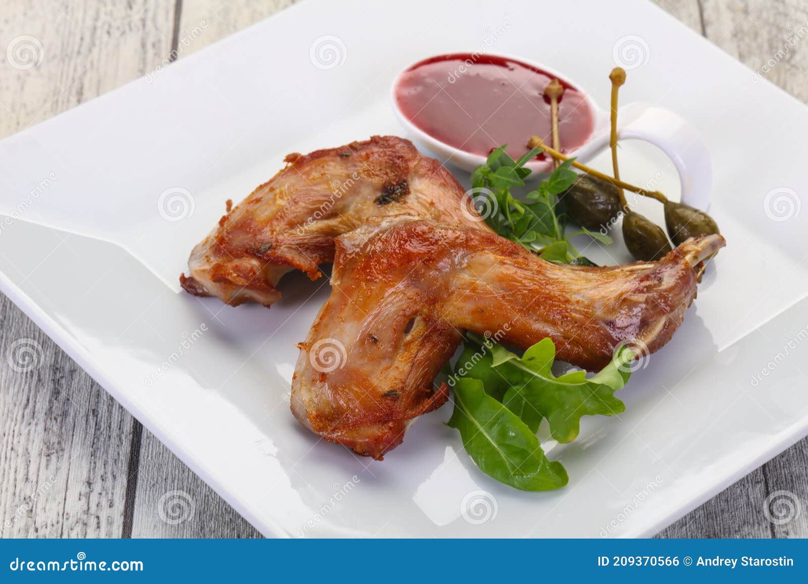 Piernas de conejo asado foto de archivo. Imagen de grilled - 209370566
