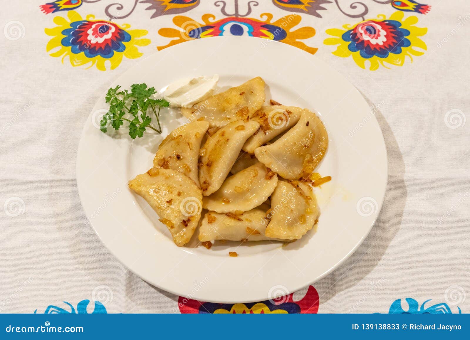 Pierogi served on a plate stock image. Image of tradition - 139138833