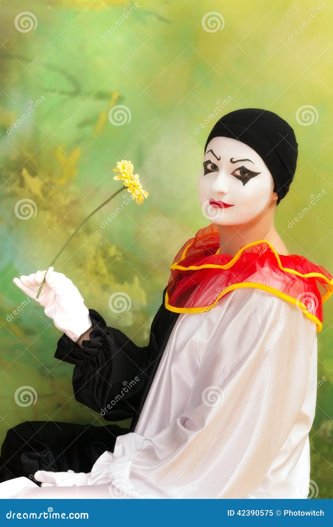Pierrot clown with flower stock image. Image of holding - 42390575