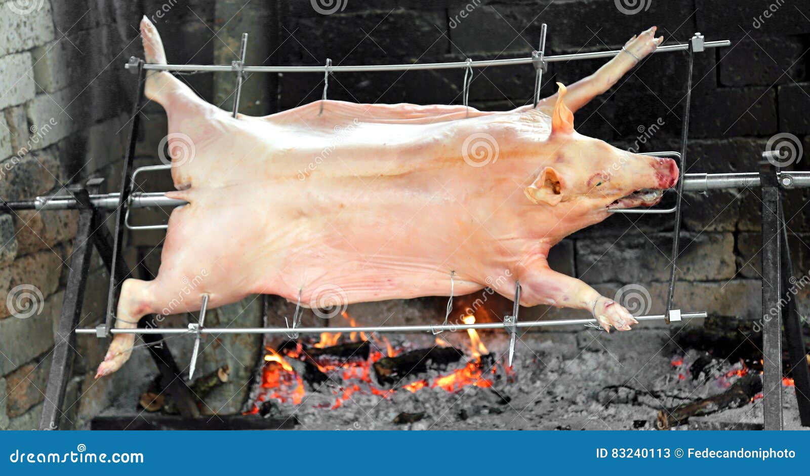 Pig while it is Cooked in the Rotating Spit Stock Image - Image of food ...