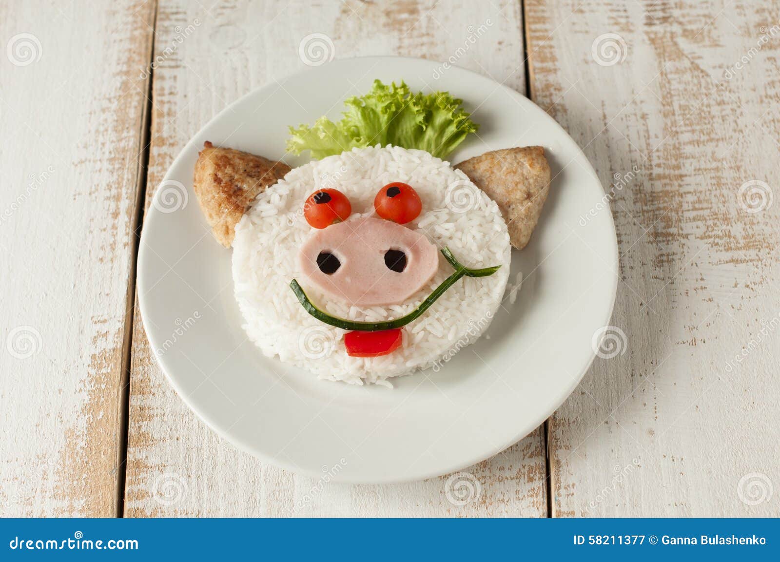 Pig from Rice and Cutlets on Plate. Stock Image - Image of cooking ...