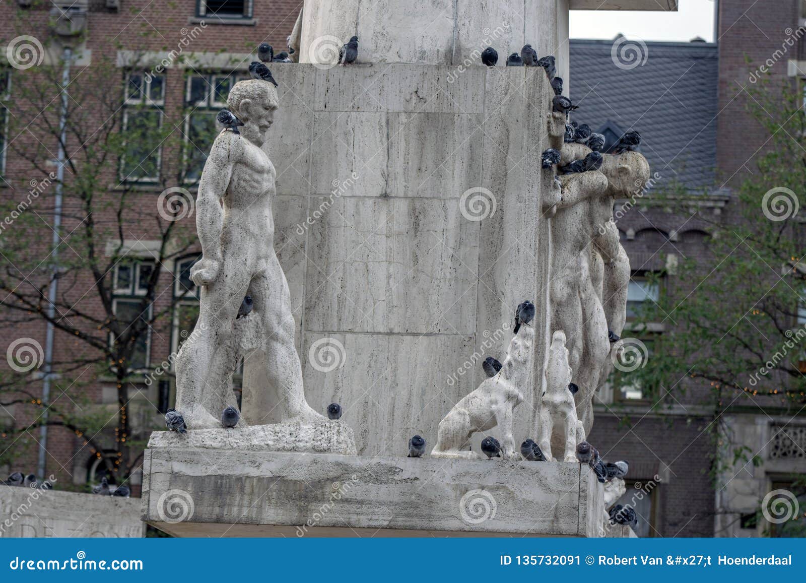 Pigeons on the Remembrance of the Dead Statue at Amsterdam the ...