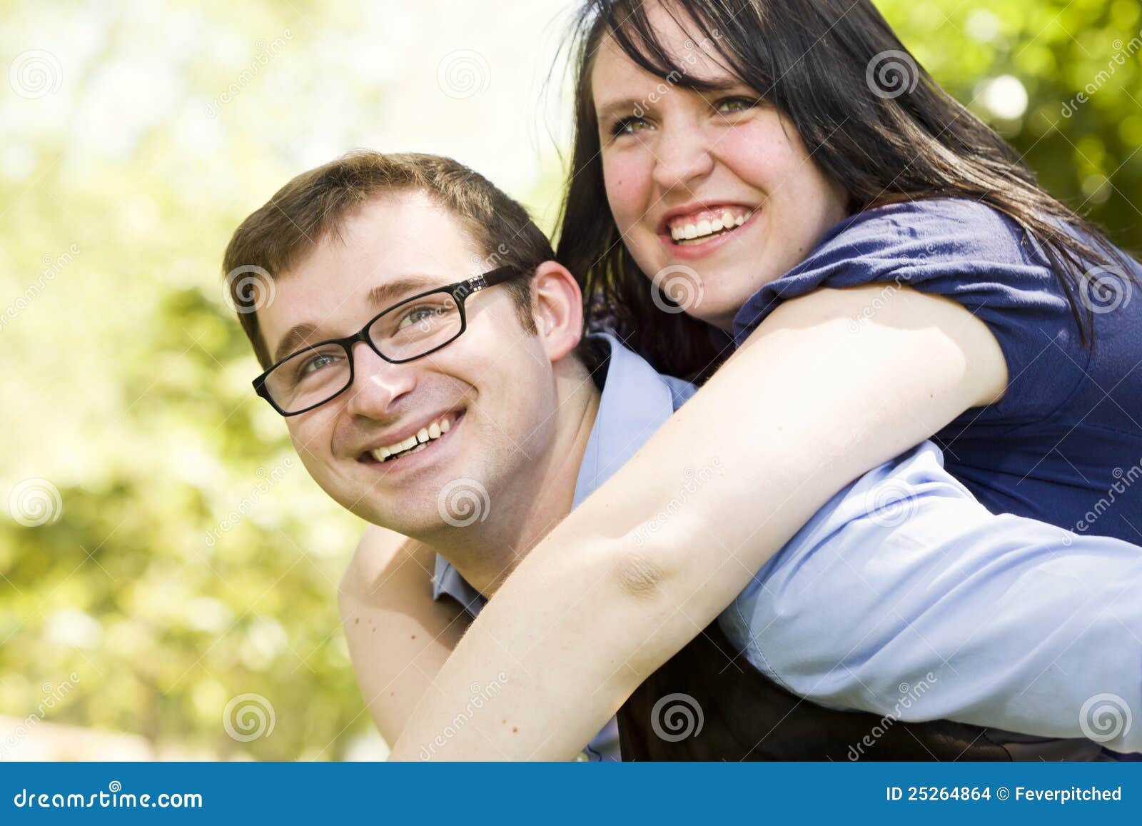 Piggy Back Rides Young Couple in the Park Stock Photo - Image of ...